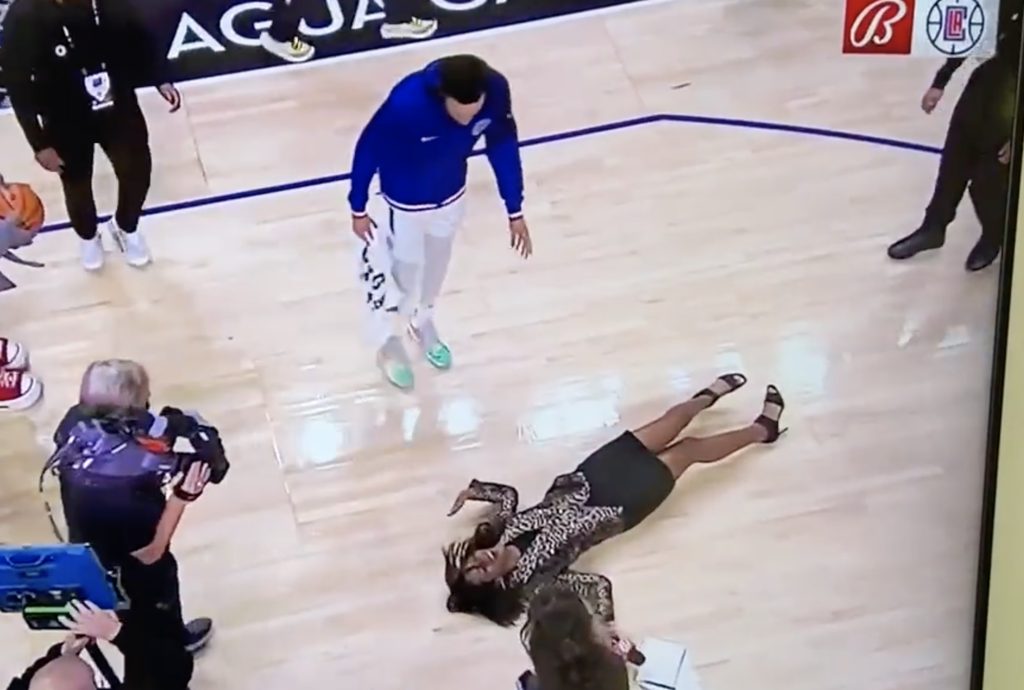 NBA Reporter Face Plants In BRUTAL Fall During Post-Game Interview