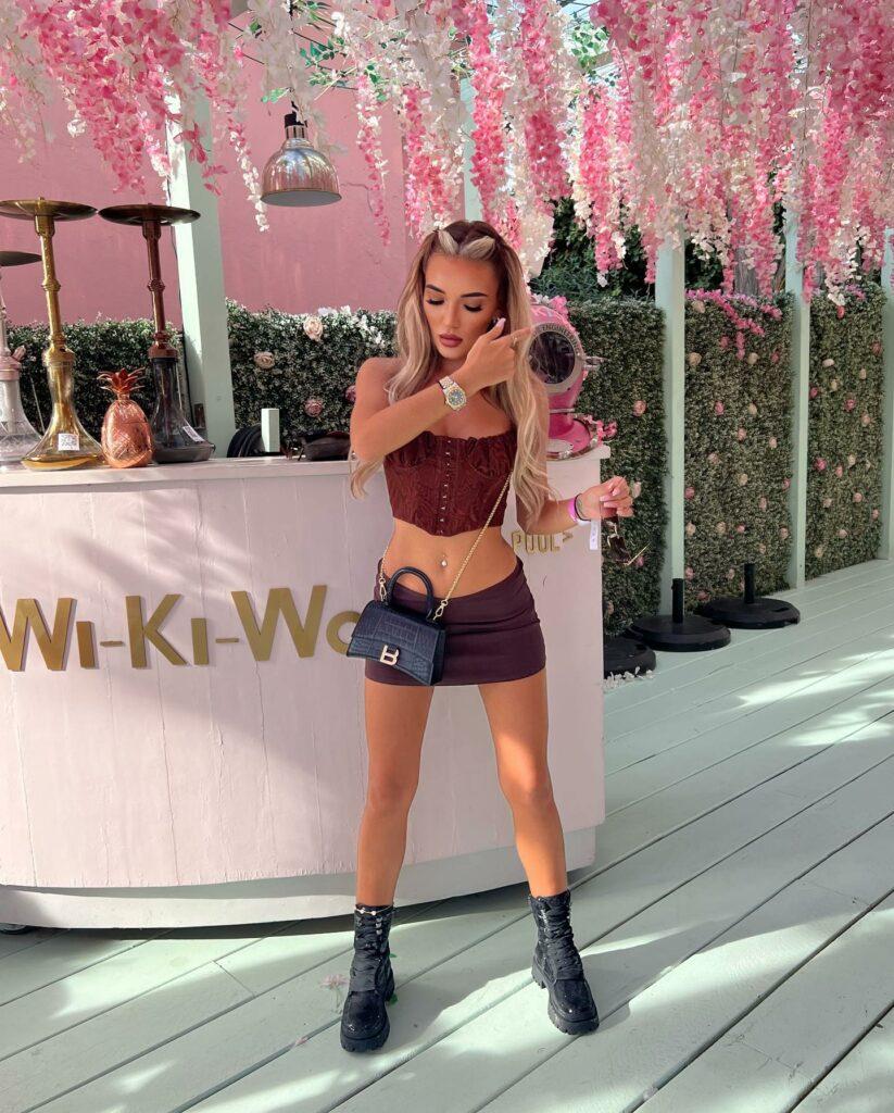 Beaux Raymond Flaunts Toned Abs In A Tiny Top