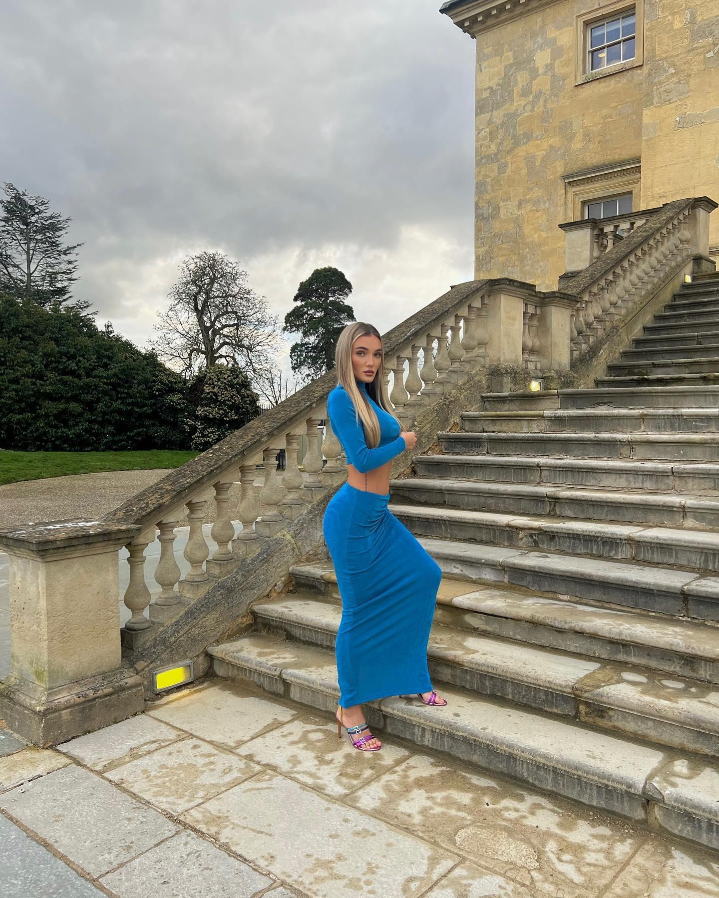 Beaux Raymond Puts On A Busty Display In A Thin Blue Crop Top