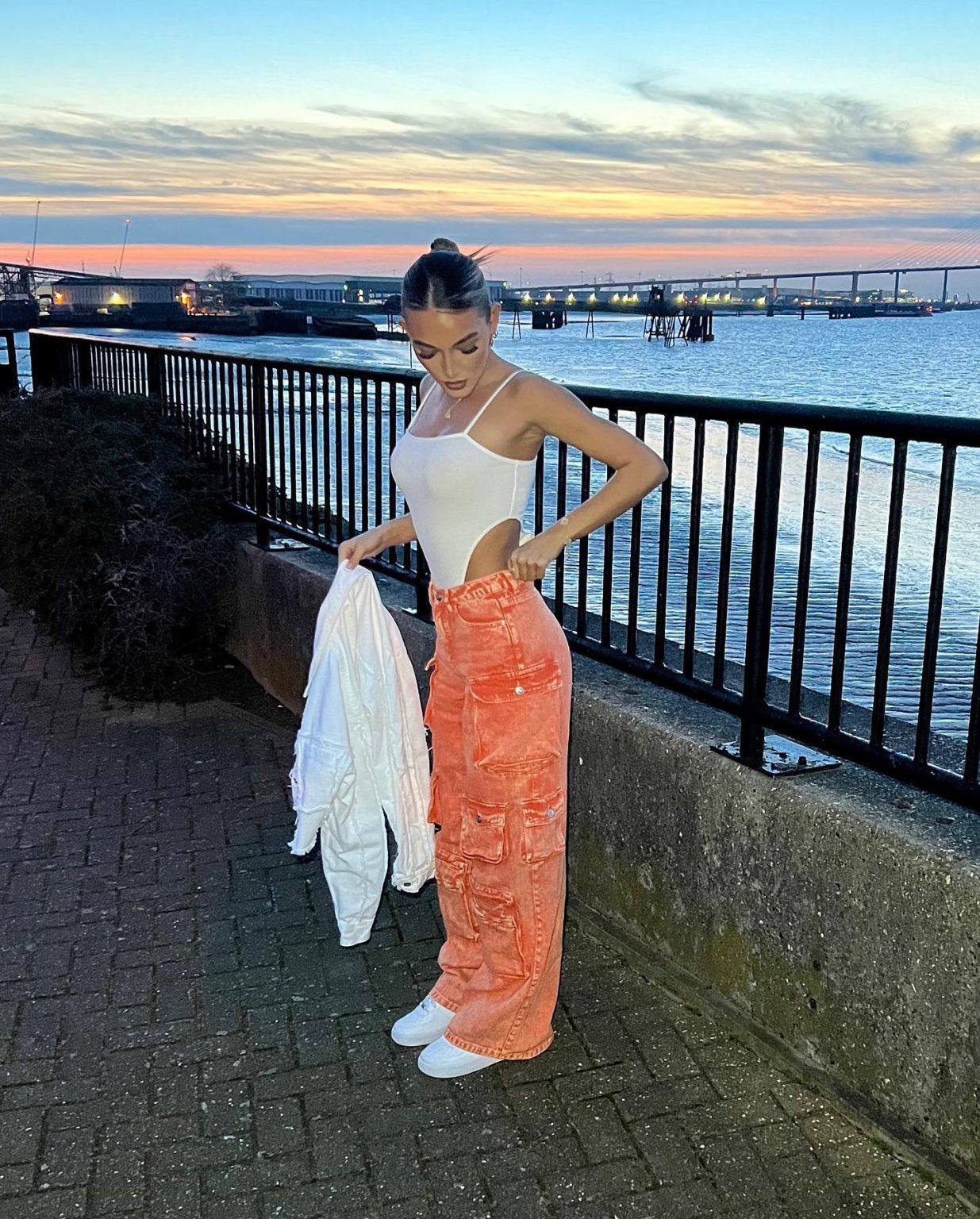 Beaux Raymond Puts On A Busty Display In Her Thin White Bodysuit