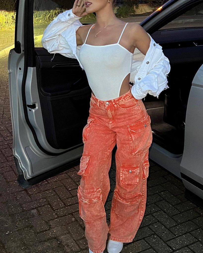 Beaux Raymond Puts On A Busty Display In Her Thin White Bodysuit