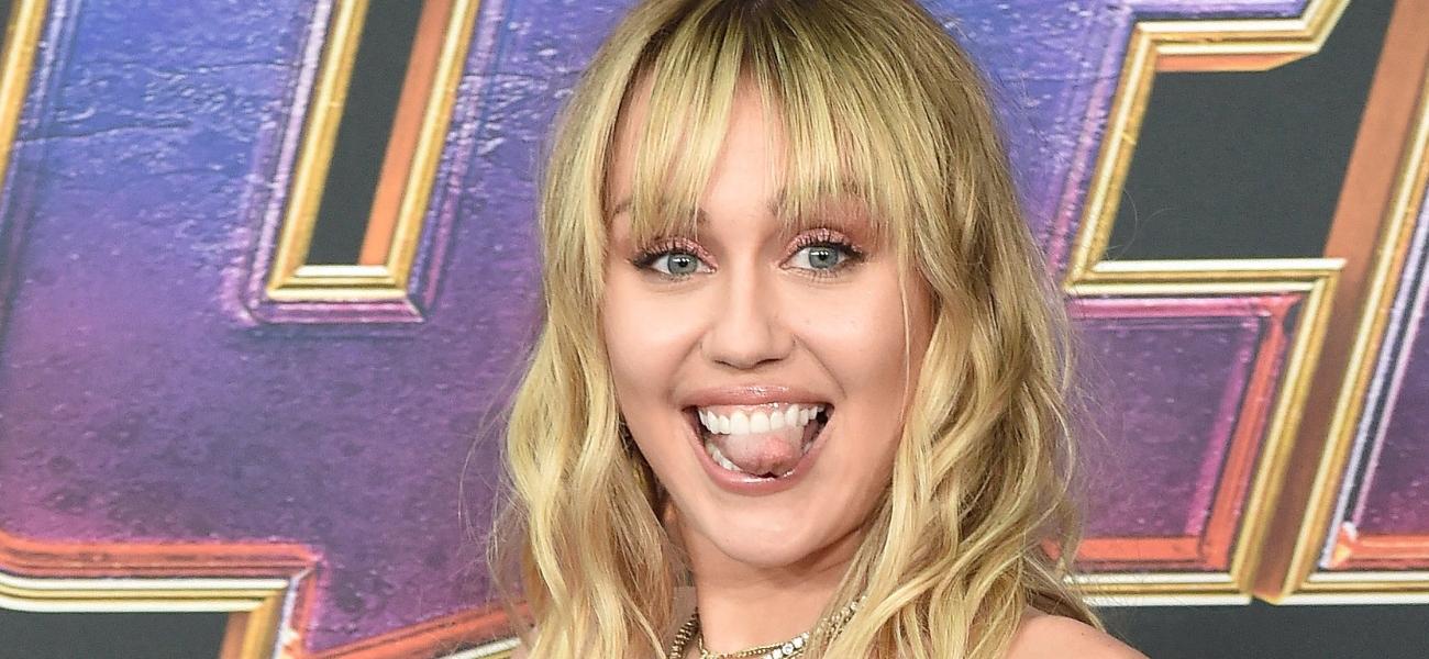 Miley Cyrus Unbuttons Her Shirt With Nothing Underneath