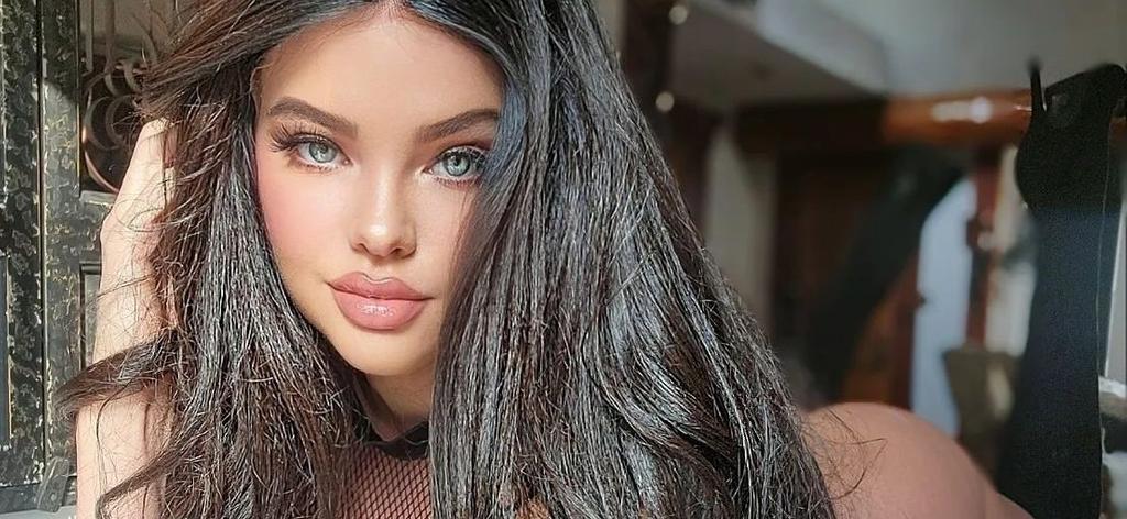 Dana Hamm Puts On A Busty Display In Barely There Lingerie