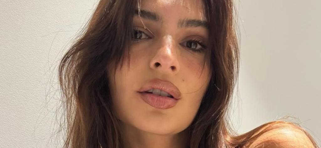 Emily Ratajkowski Exposes Chest In Classy Balcony Look