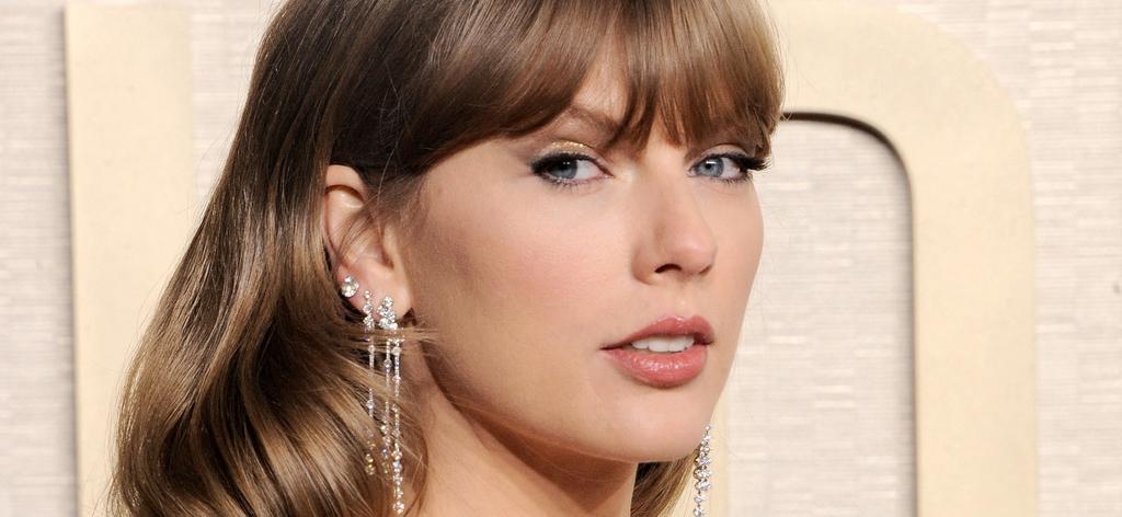 Taylor Swift Waving Flag In Striped Swimsuit 'Broke The Internet'