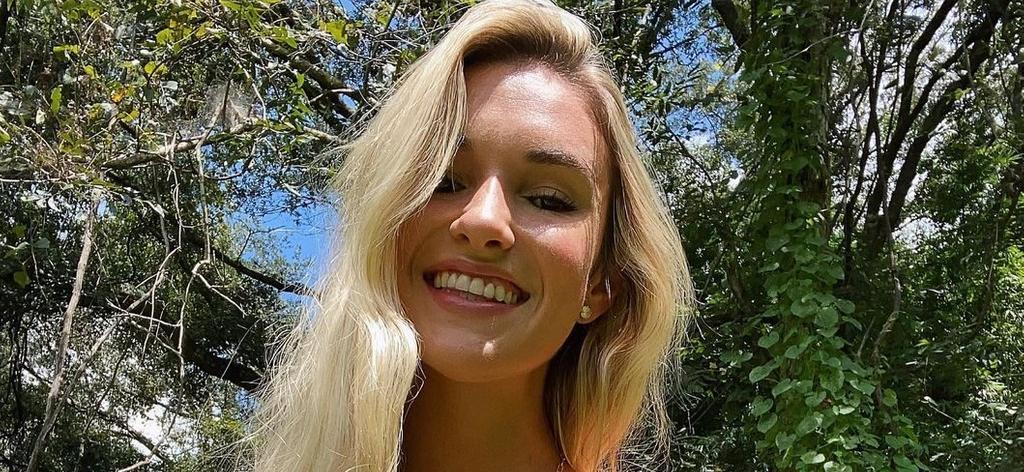 Volleyball Star Kayla Simmons Swims With Sharks In Thong Bikini