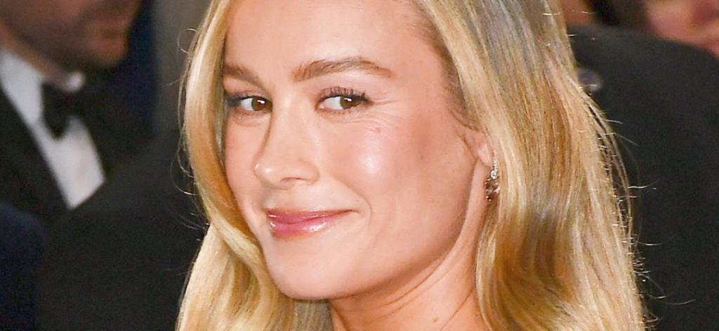 Brie Larson Thrills In Tight Swimsuit For River Sunbathe