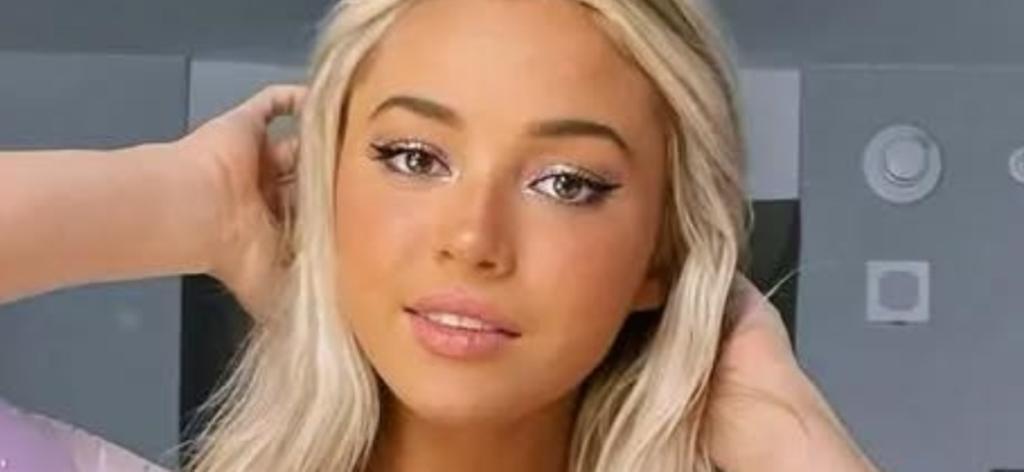 Gymnast Olivia Dunne Arches Back In Bikini For 'Sports Illustrated'