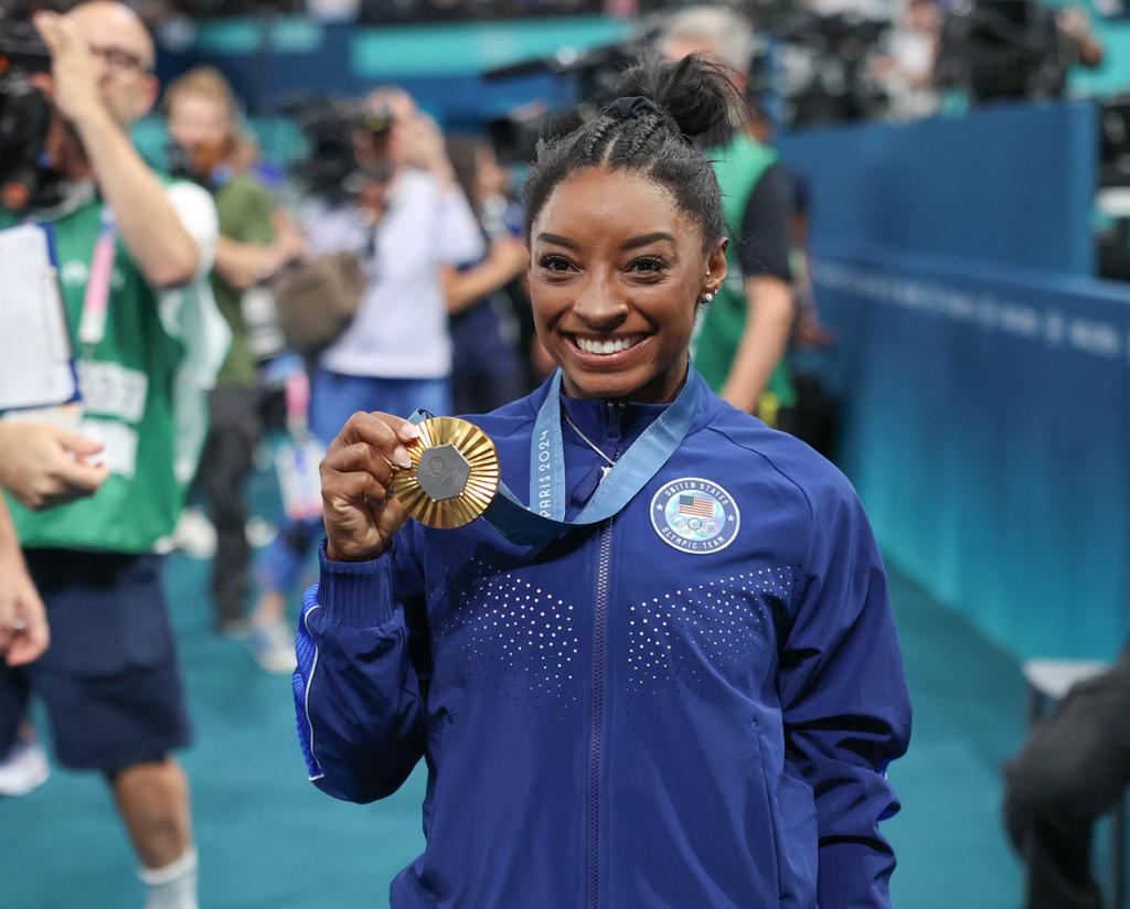 Simone Biles Opens Up On G.O.A.T. Necklace In The Olympics