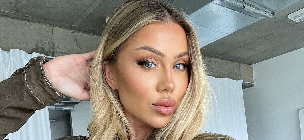 Laura Amy In Tiny Black Bikini Bottoms Suns Her Buns