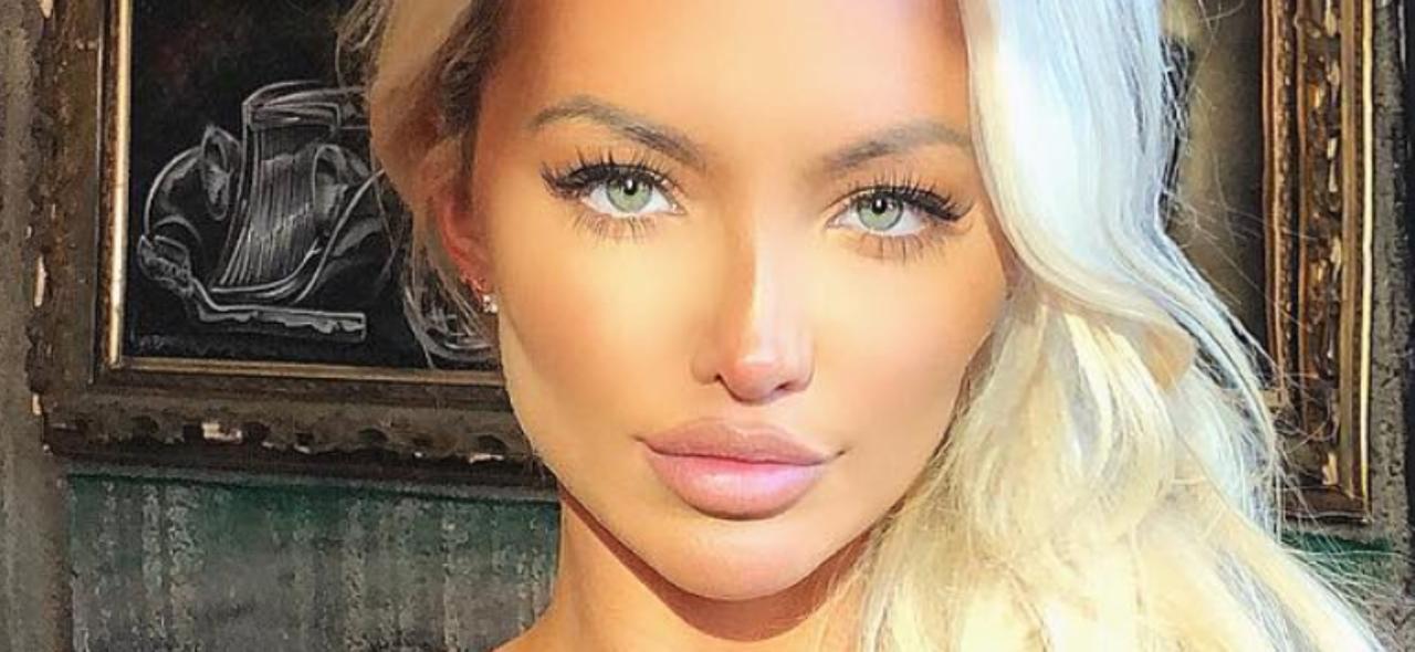 Lindsey Pelas In Plunging Braless Dress Is 'Looking For The One'