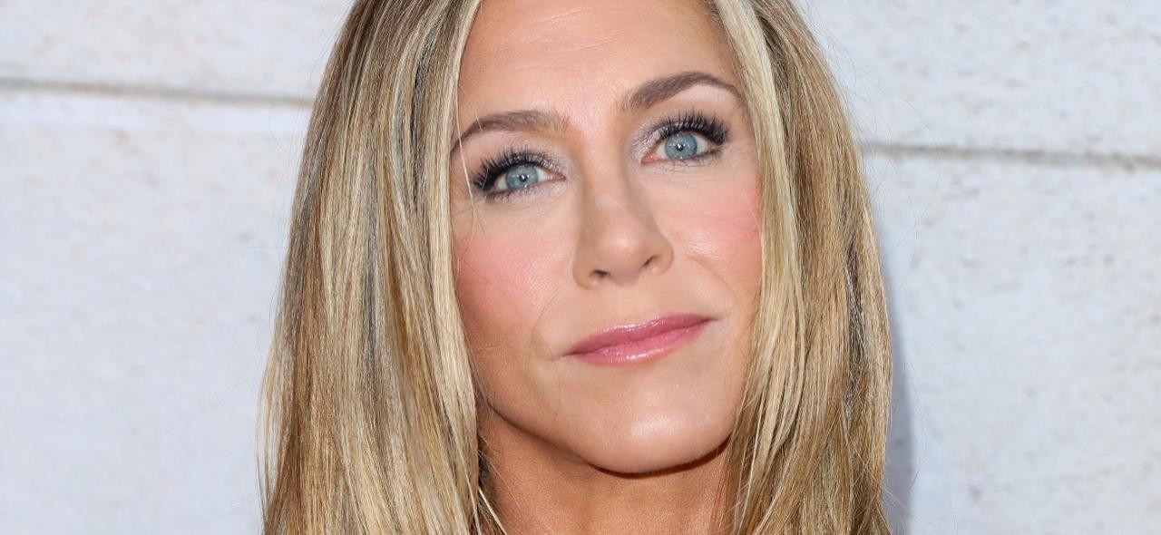 Jennifer Aniston Sparks Complaints In Plunging Workout Swimsuit