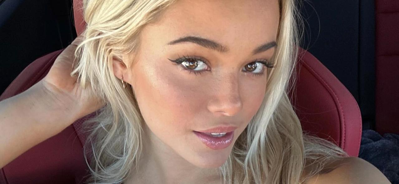 Olivia Dunne 'Breaks The Internet' In Plunging Glitter Swimsuit