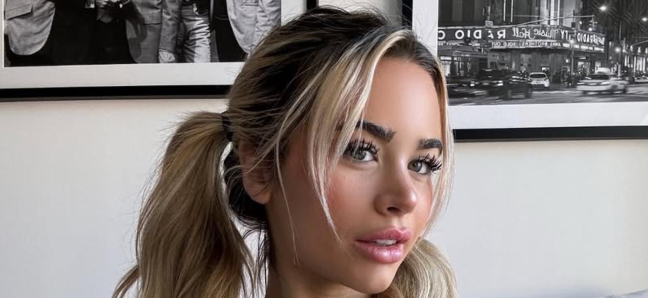 Emily Elizabeth Pops Out Of Bikini Top In 'Bora Bora Throwback'