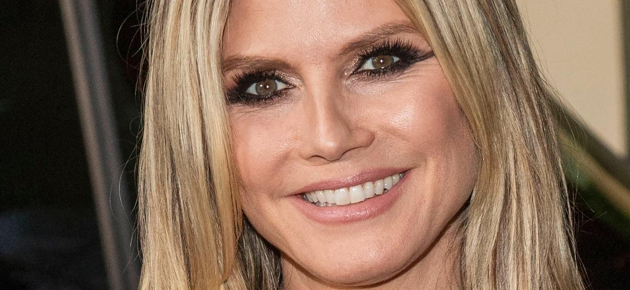 Heidi Klum Waters Her Plants In A Stringy Flesh Bikini