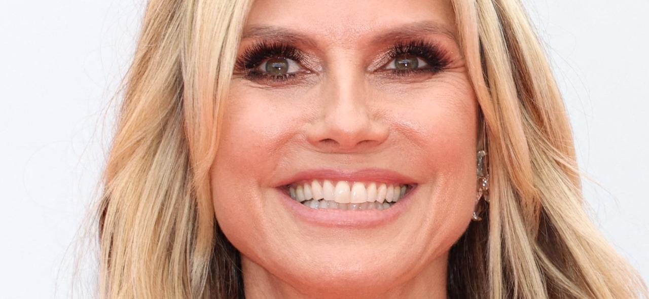 Heidi Klum Celebrates Her 'Boob Hair' In Plunging Braless Dress