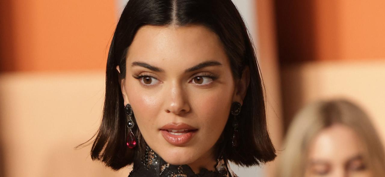 Kendall Jenner Nearly Spills Out Of Bikini In Playful Beach Photos
