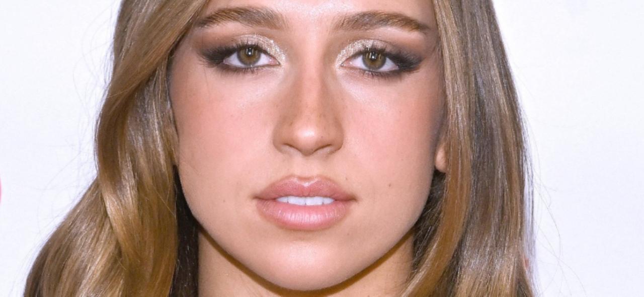 Tate McRae 'Outstanding' Kneeling In A G-String And High Heels