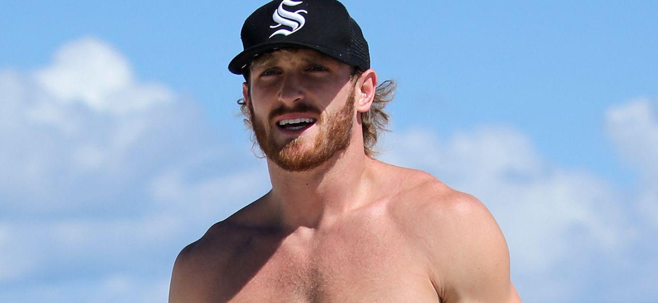 Logan Paul Flaunts 'Champ Life' With New Steamy Photos