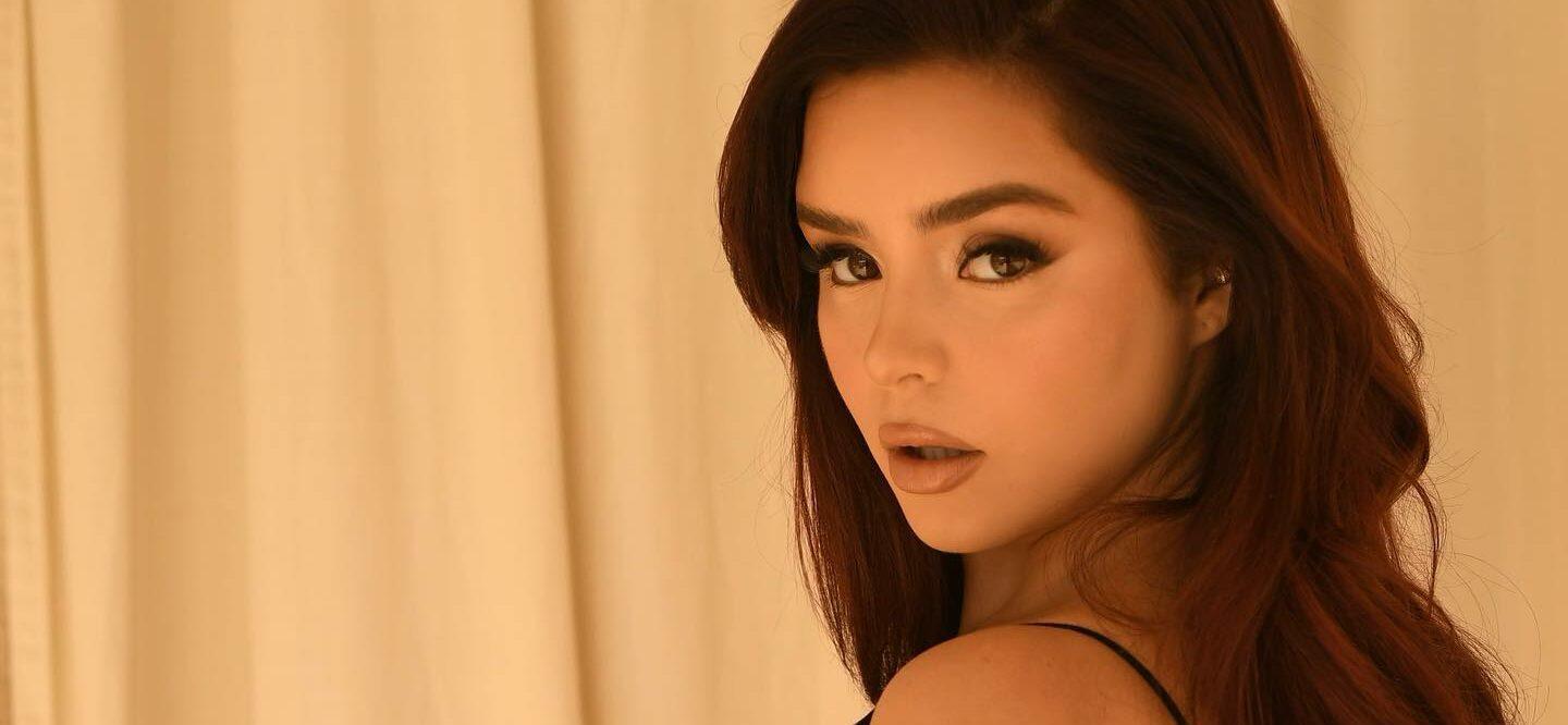 Demi Rose Cups Her Chest In A Festive Red Corset