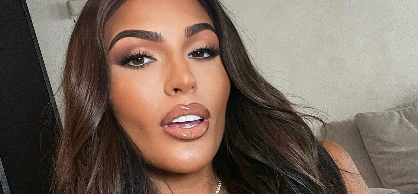 Emily Faye Miller Celebrates 'Big City Life' In A Tiny Strapless Dress