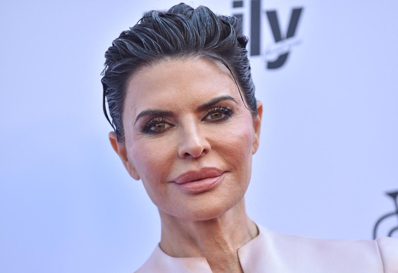 Lisa Rinna Turns Heads With Bold Wigs At Paris Couture Week