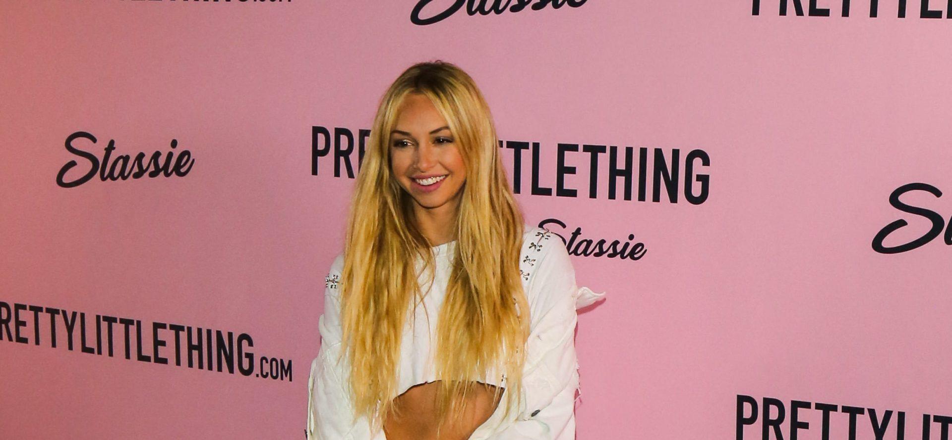 Corinne Olympios Puts Abs On Display In Workout Attire