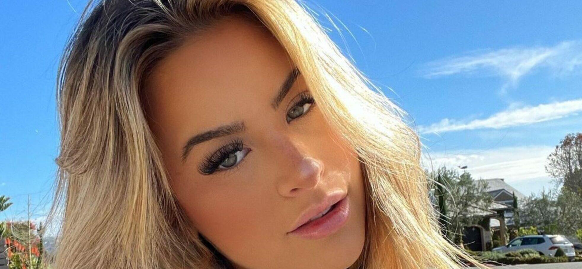 Emily Elizabeth Gives Eye Popping Busty Display In Her Swimsuit