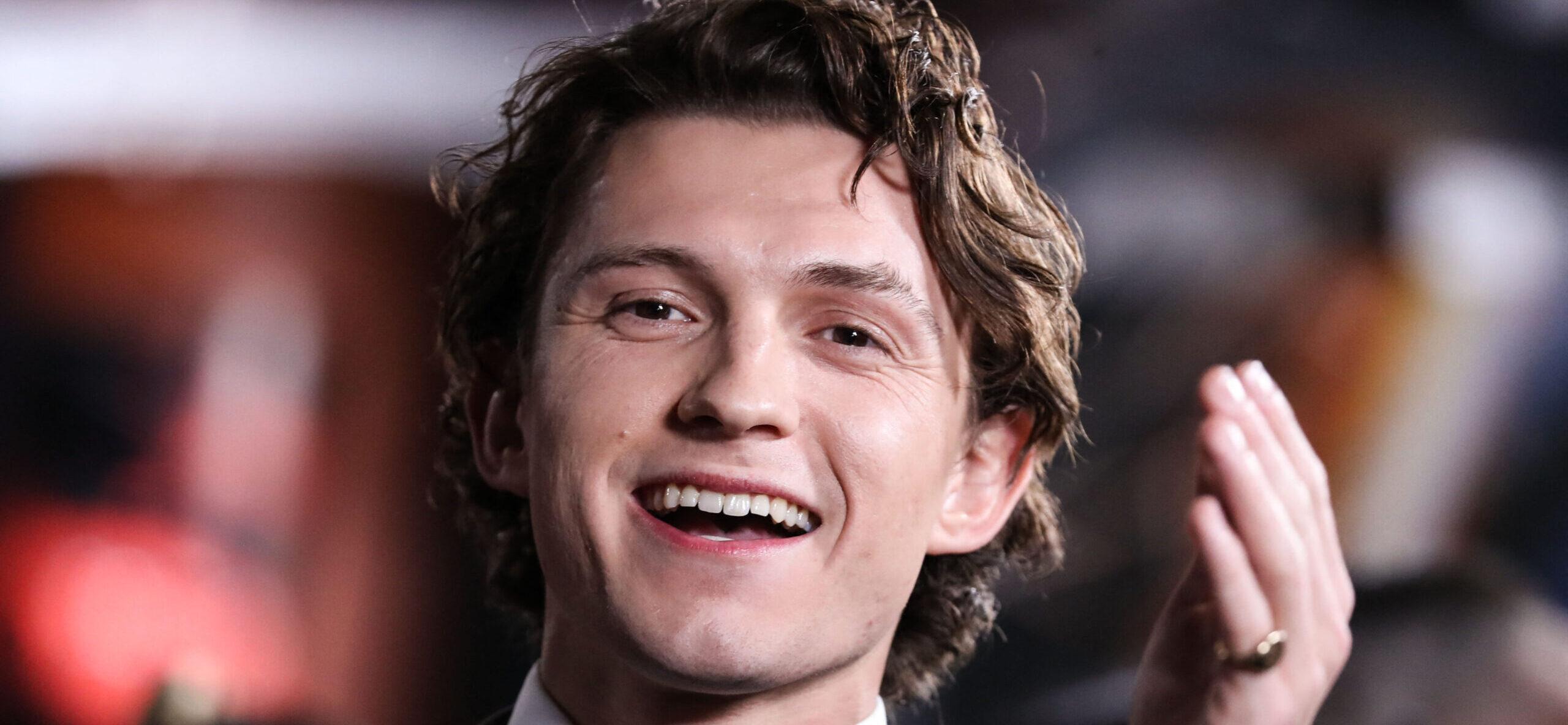 Tom Holland Almost KNOCKS Himself Out Waving Flag At Monaco GP