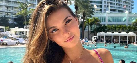 Grace Boor Lets Massive Chest Burst Out Of Her Tiny Red Bikini