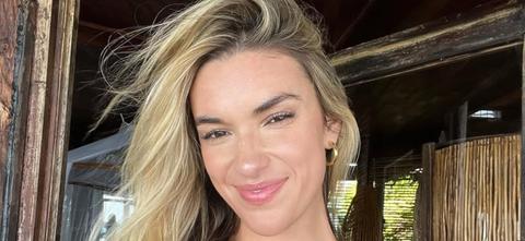 Kayla Simmons Stuns In Pink Swimsuit During Poolside Relaxation