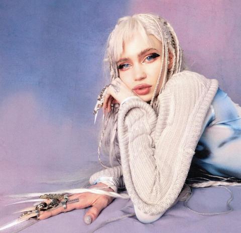 Grimes Makes A Grand Exit From Columbia Records