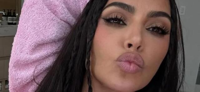 Kim Kardashian Shows Off Iconic Curves In Tiny White Bikini