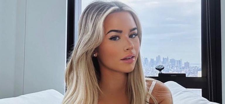 Emily Elizabeth In Her Tight Black Bodysuit Gives Off Sexy 'Onesie Vibes'