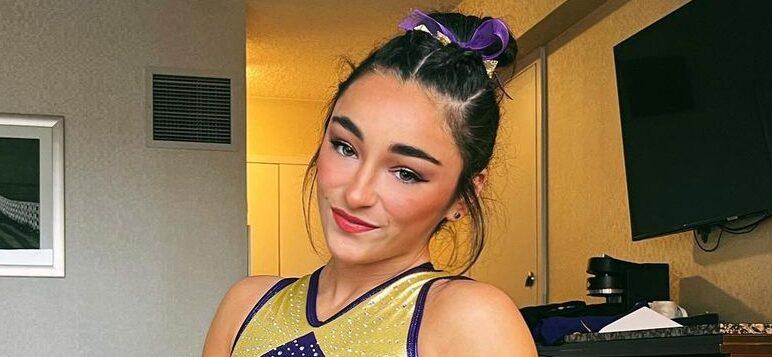LSU Gymnast Elena Arenas Bares Her Abs In A White Cut-Out Dress