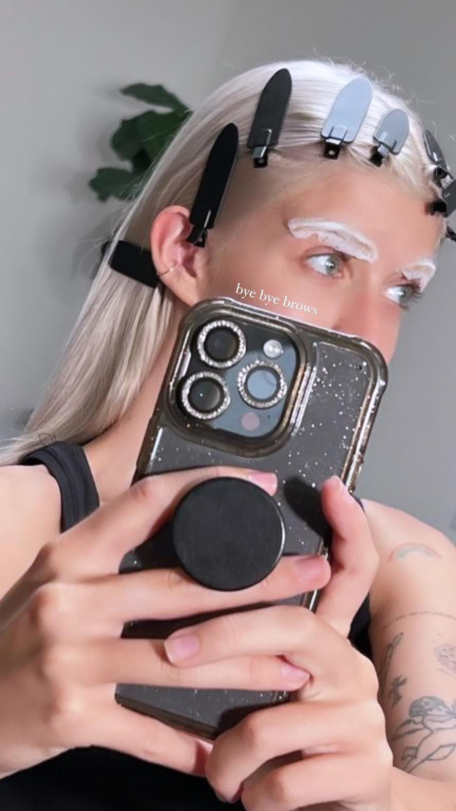 Sami Sheen In Bandeau Top Teases Toned Abs and Bleached Eyebrows