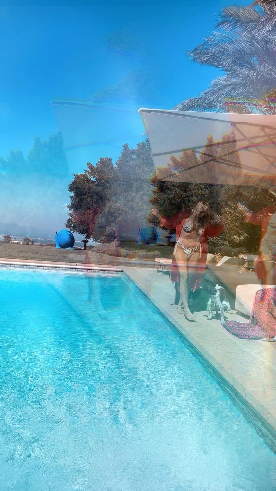 Heidi Klum In Animal-Print Two-Piece Frolics By The Pool