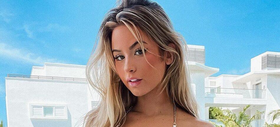 Emily Elizabeth Shows Off Plenty Of Skin In Her Tiny Brown Bikini