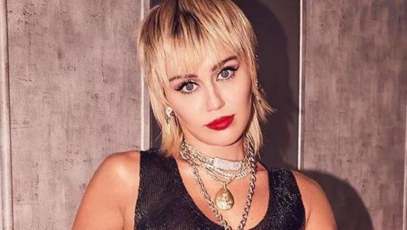 Miley Cyrus Opens Jacket Shirtless Without Bra While Uncensored The Blast